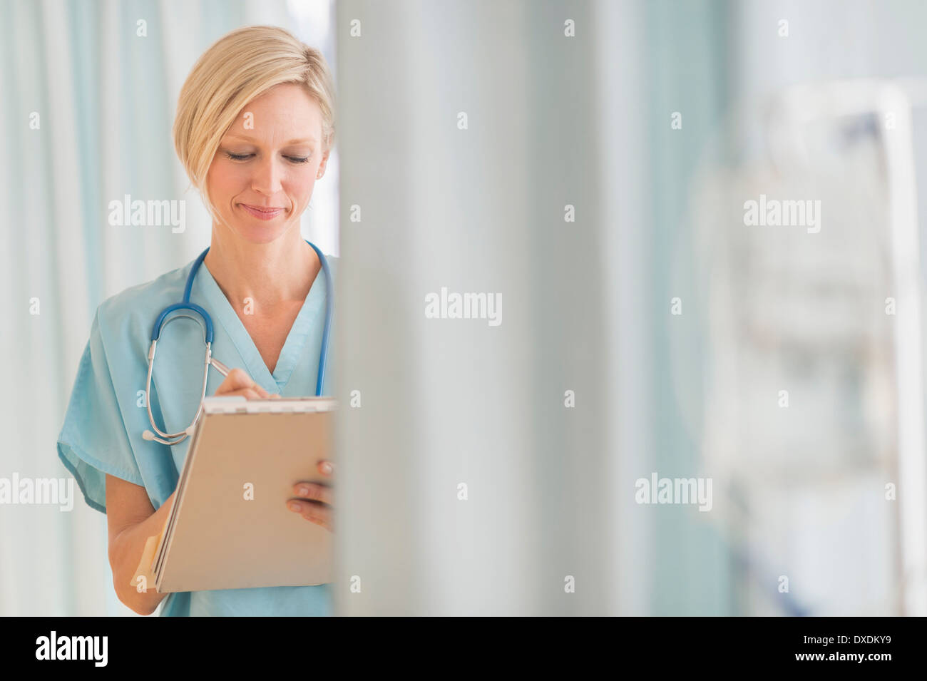 Female healthcare professional writing hi-res stock photography and ...