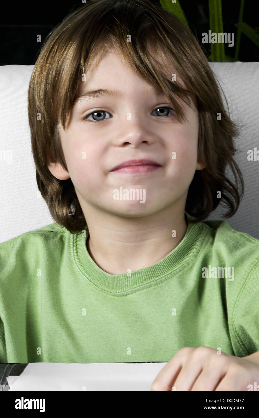 Boy facing camera Stock Photo - Alamy