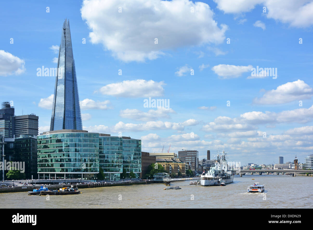 Shard building skyline and high tide on the River Thames at The Pool of ...