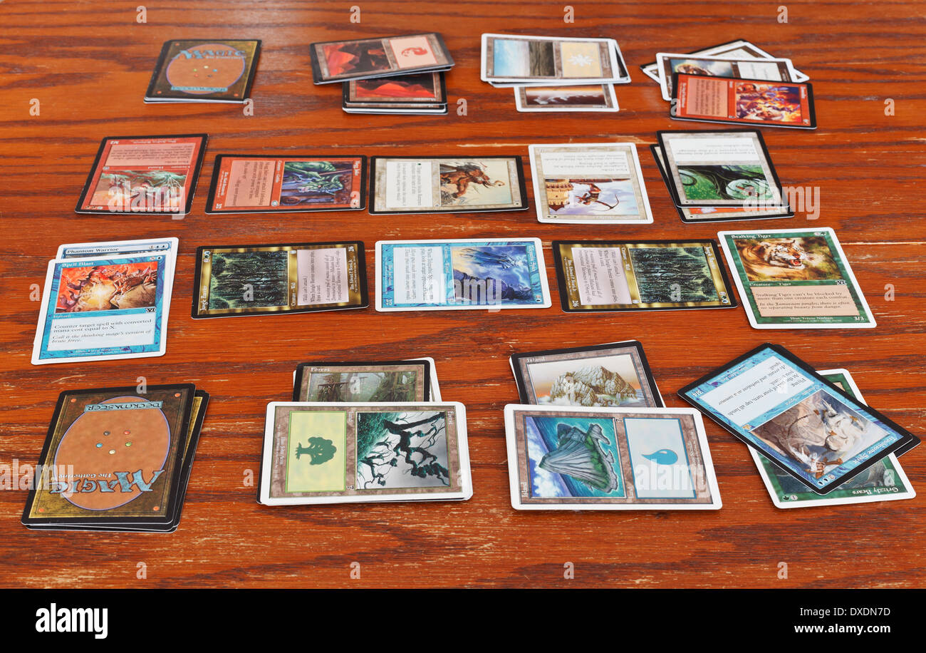 wizards battle in card game Magic: The Gathering Stock Photo - Alamy