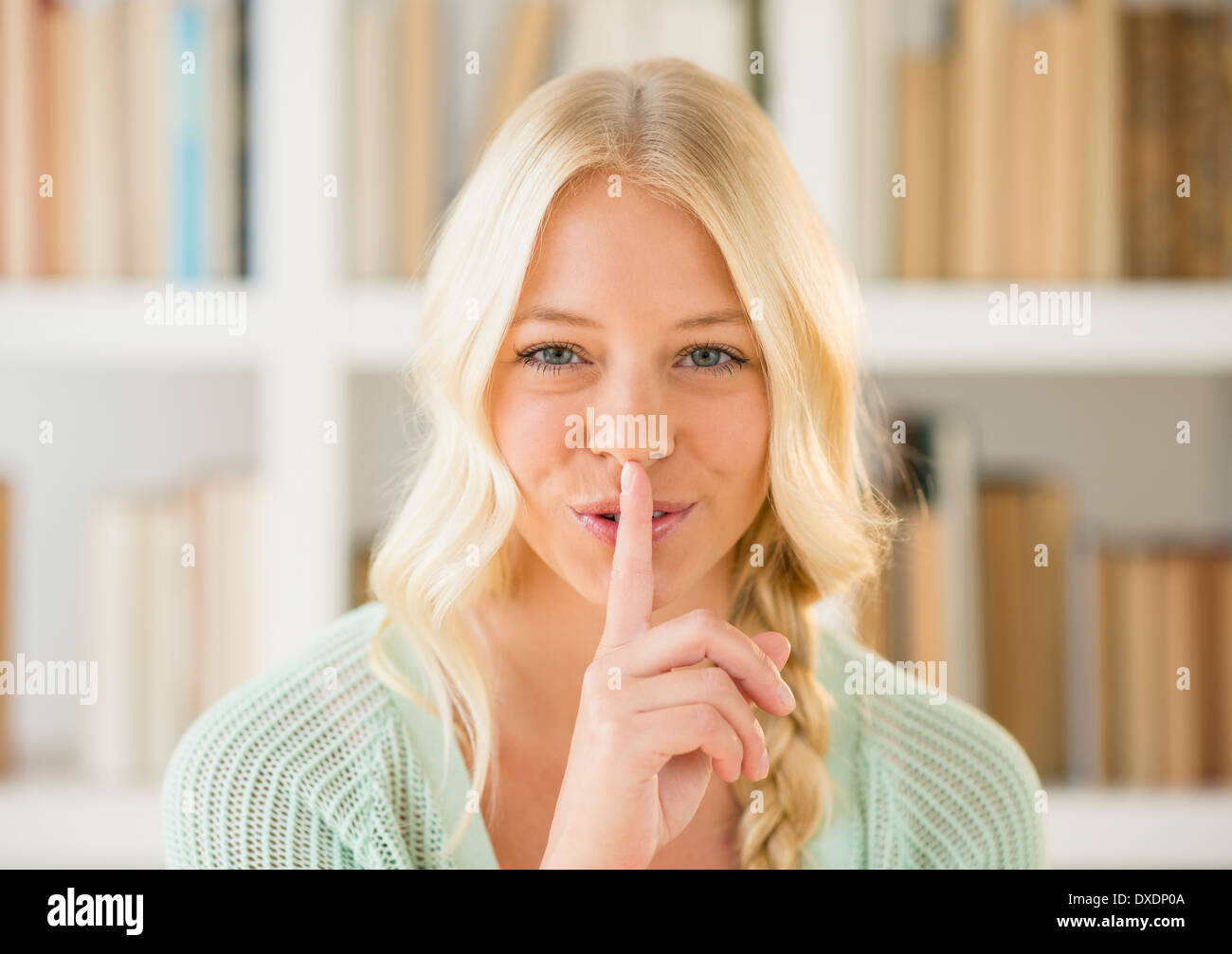 Finger on lips hi-res stock photography and images - Alamy
