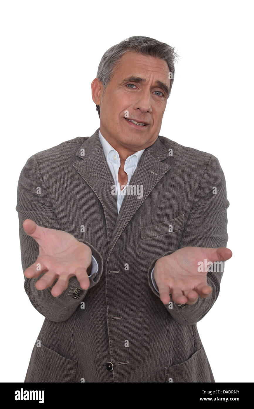 Senior businessman asking why Stock Photo - Alamy