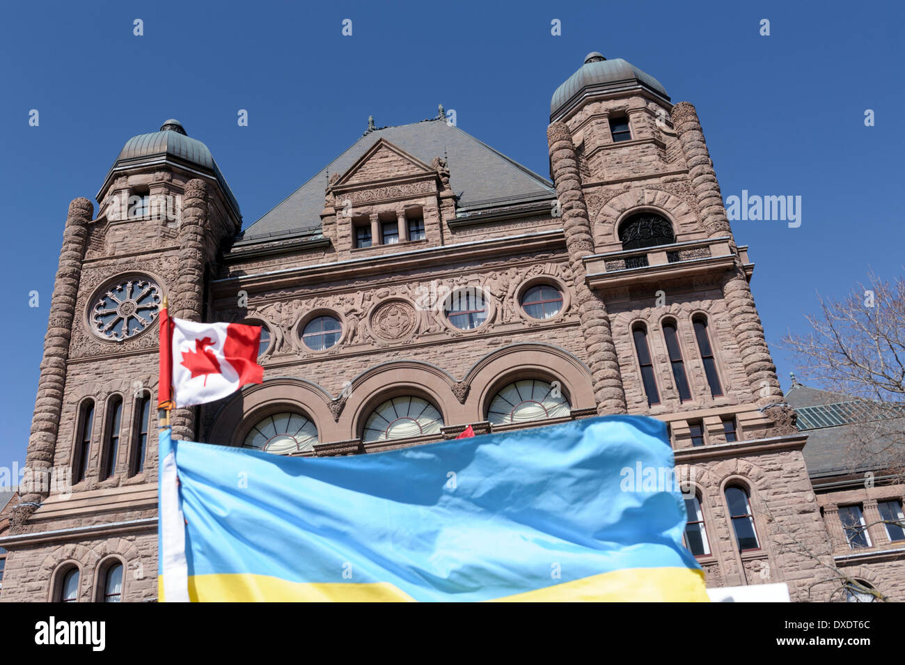 Toronto, Canada. 23rd March 2014. Ukrainian and Canadian flags are at ...