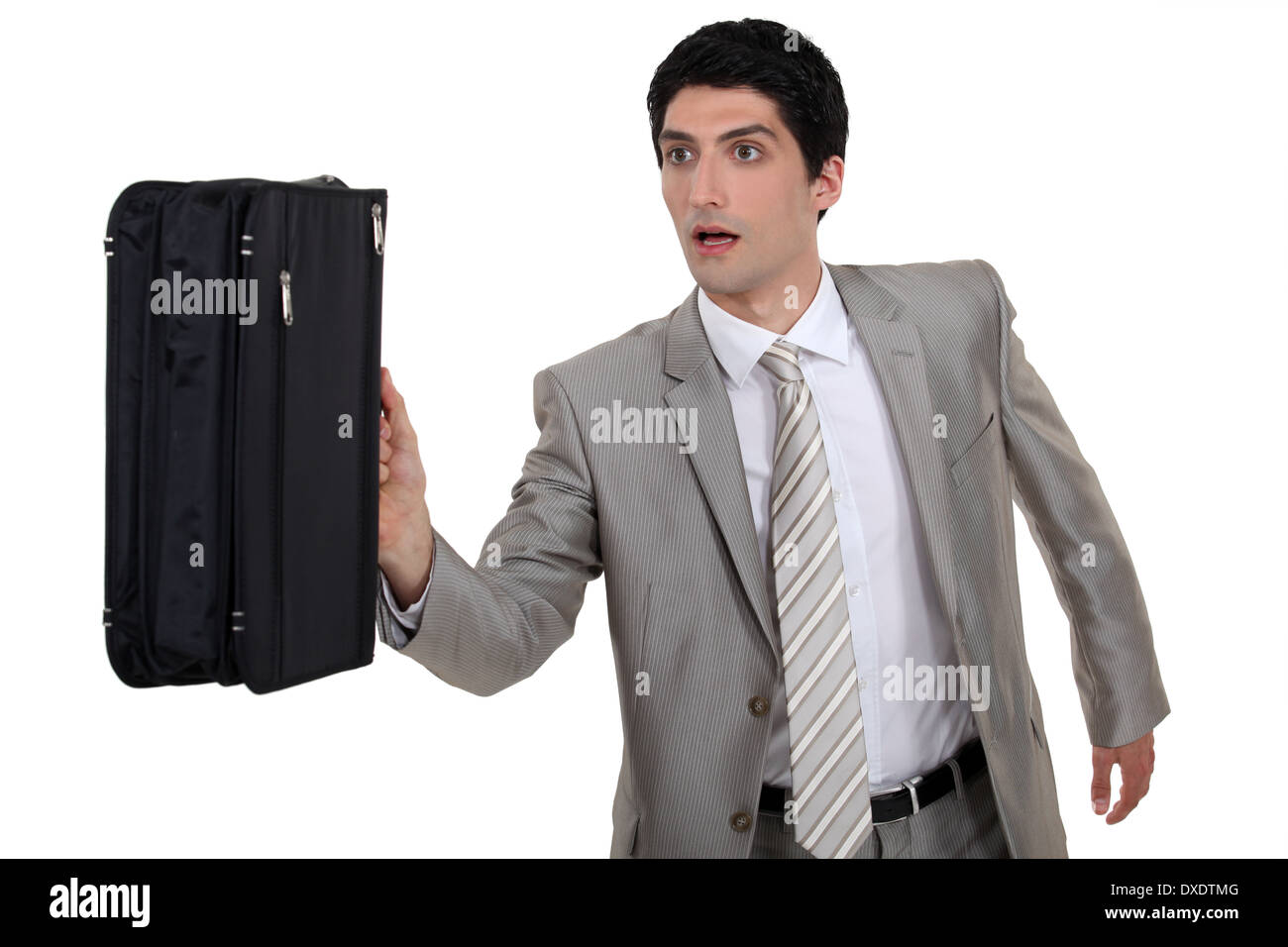 Man running with briefcase Stock Photo - Alamy