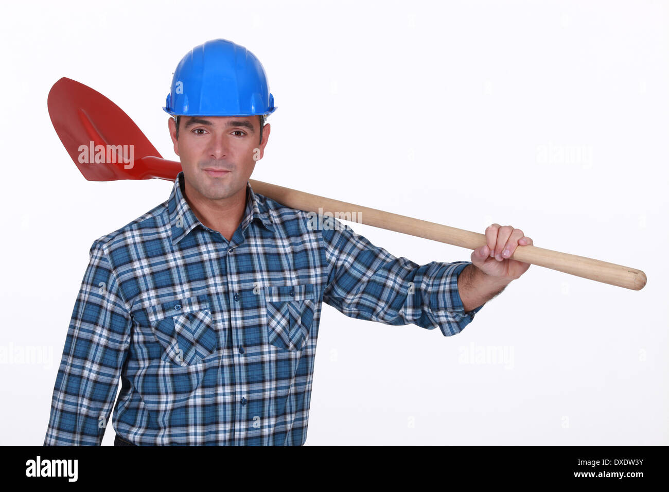 Construction worker with a shovel Stock Photo - Alamy