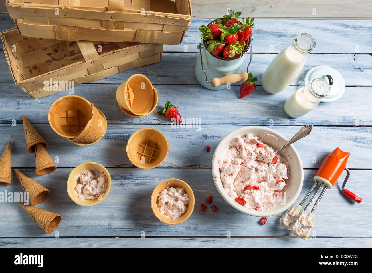 Homemade production of strawberry ice cream Stock Photo - Alamy