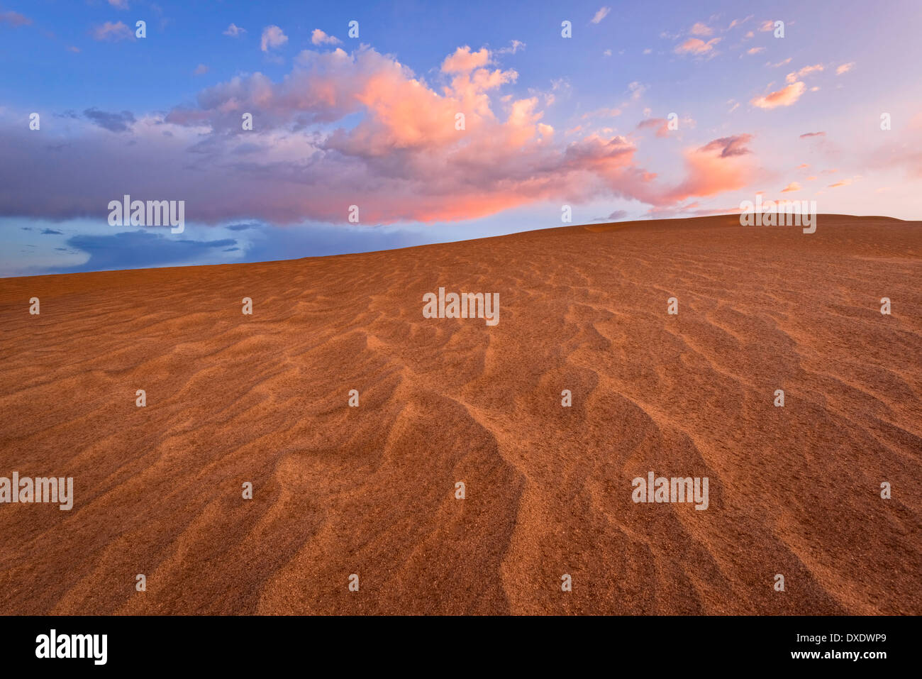 Sand dune and clouds during sunset, Christmas Valley, Oregon, USA Stock ...