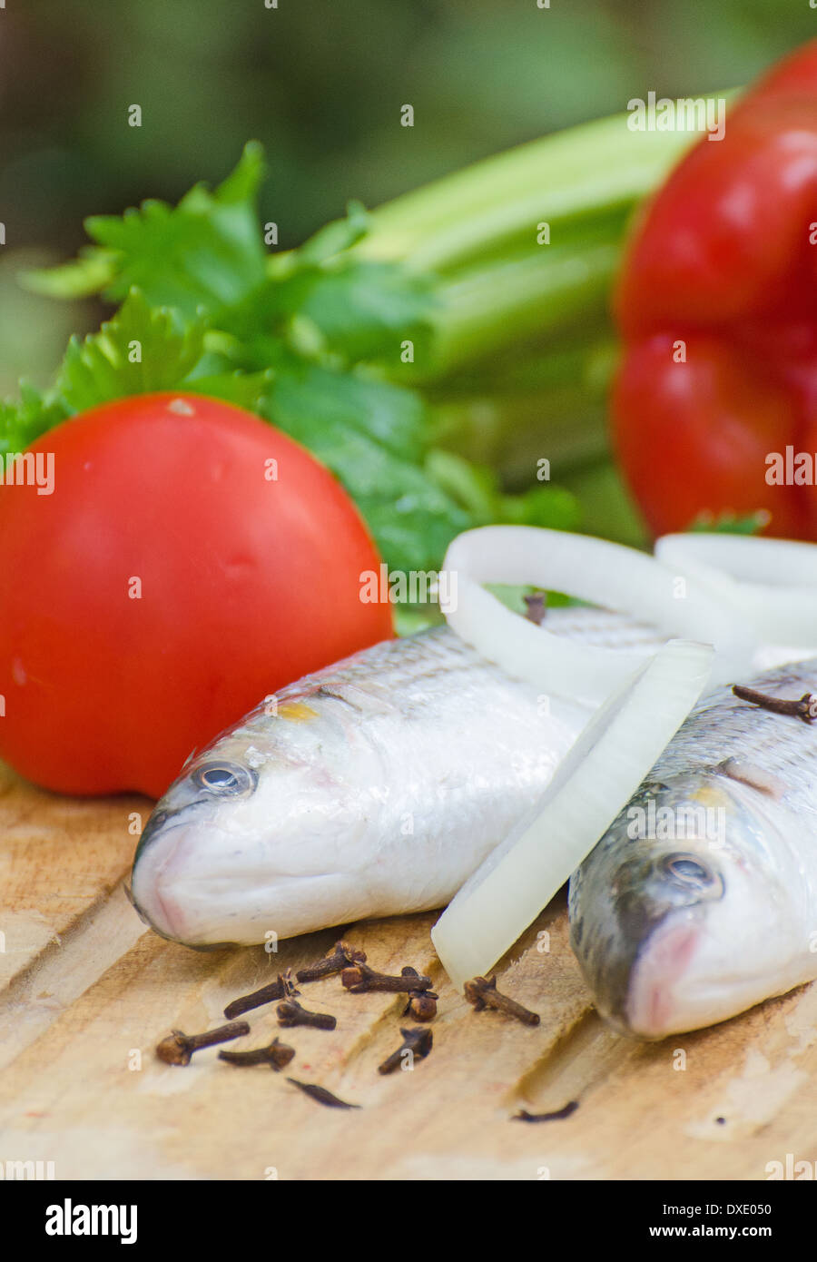 Mugil cephalus fish with vegetables Stock Photo - Alamy