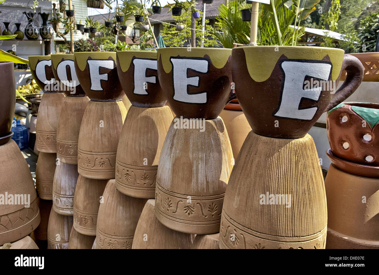 Coffee advert. Garden center feature of clay pots suitable for coffee ...