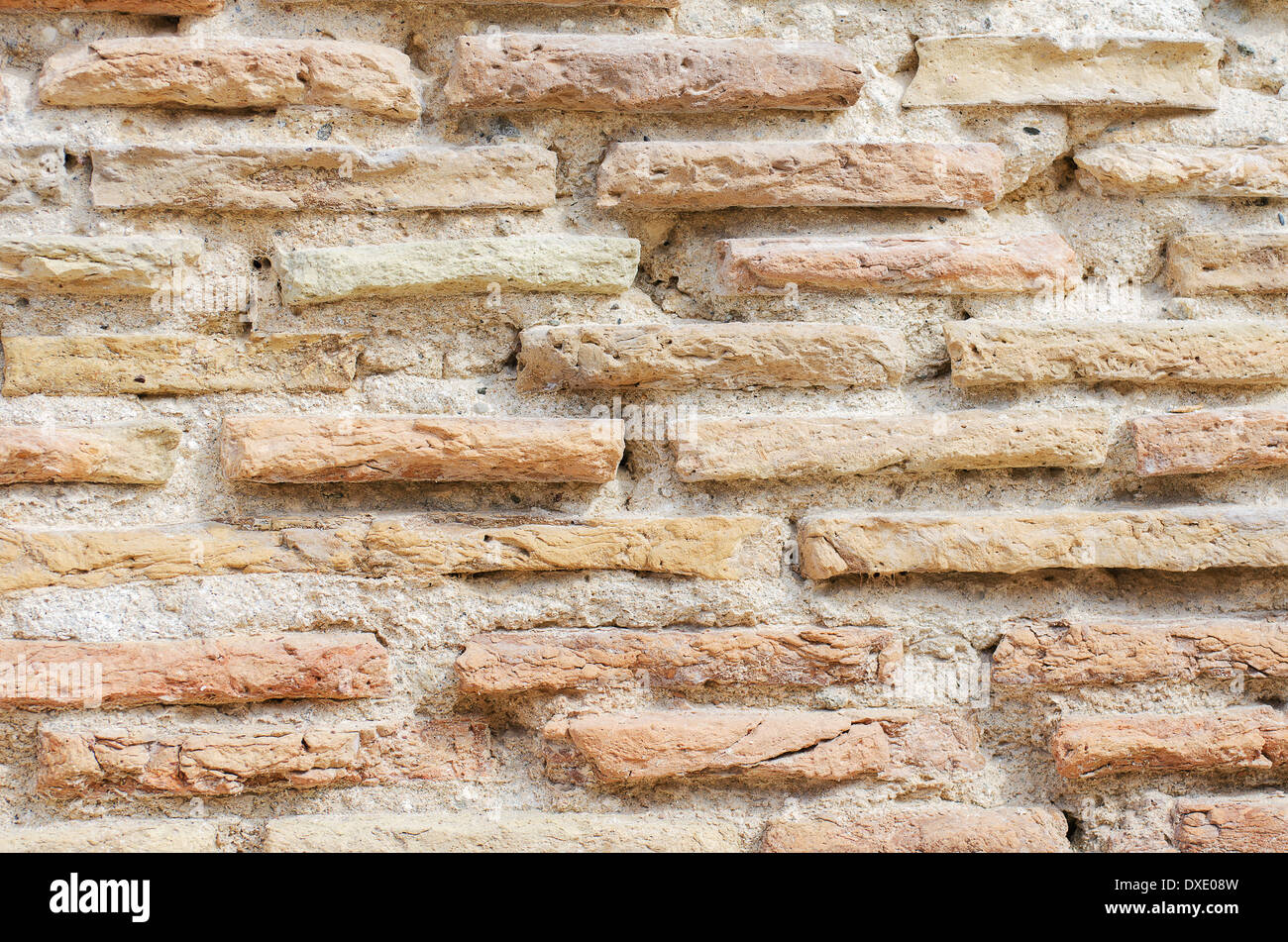 Very ancient brick wall built Stock Photo - Alamy
