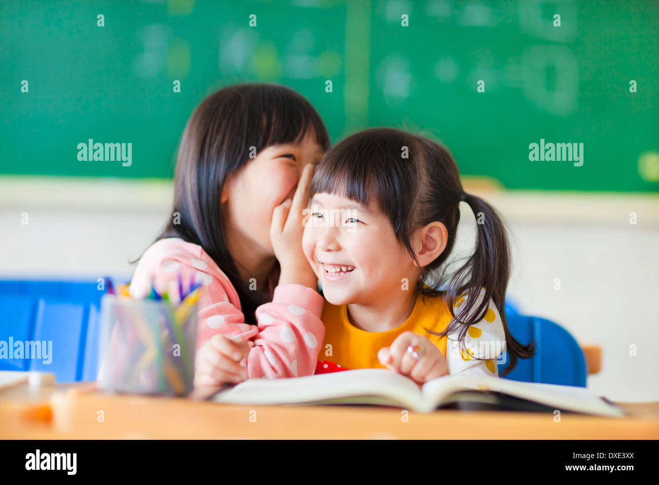Girls Whispering Class High Resolution Stock Photography and Images - Alamy