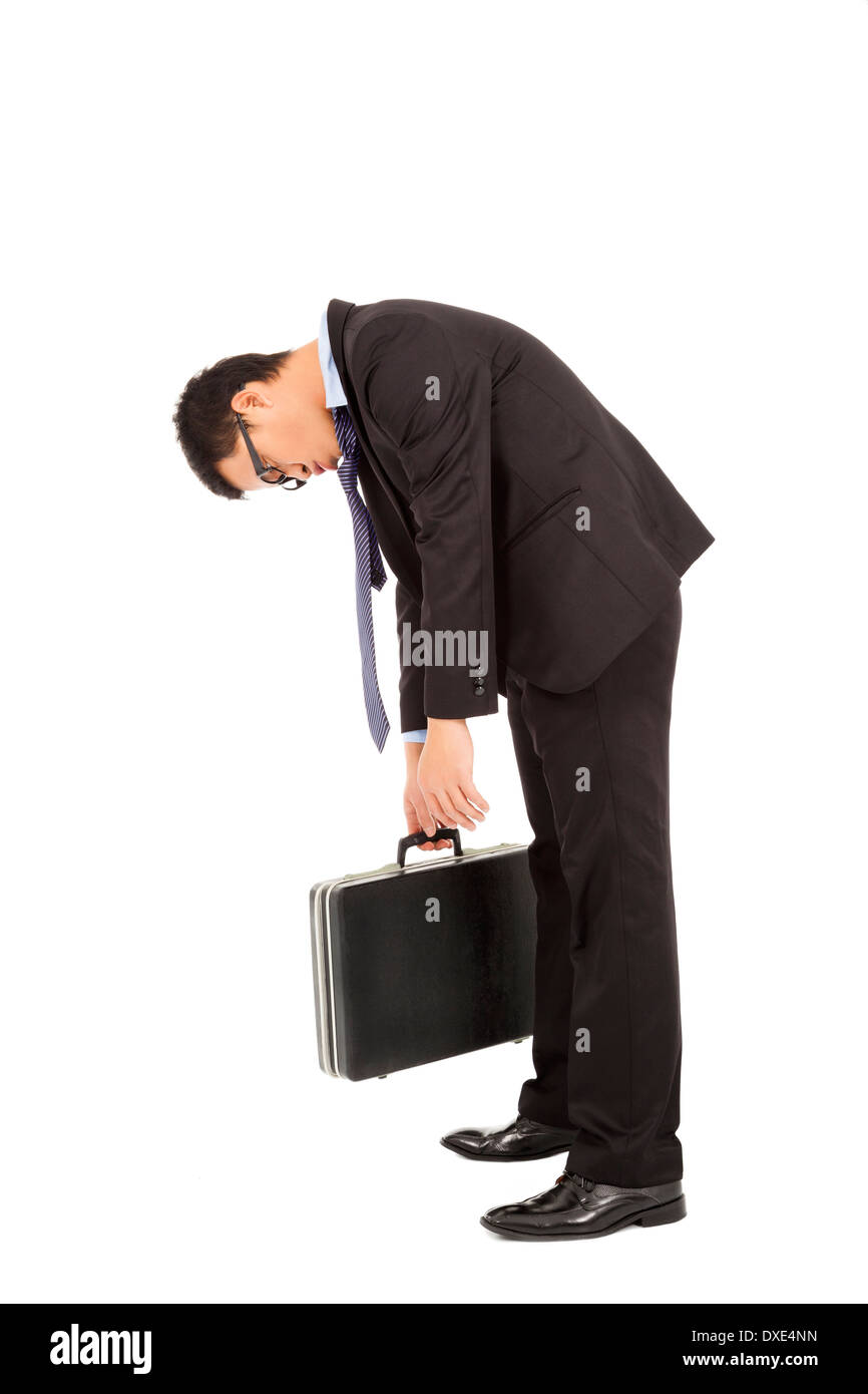 very tired businessman stoop and holding briefcase over white ...