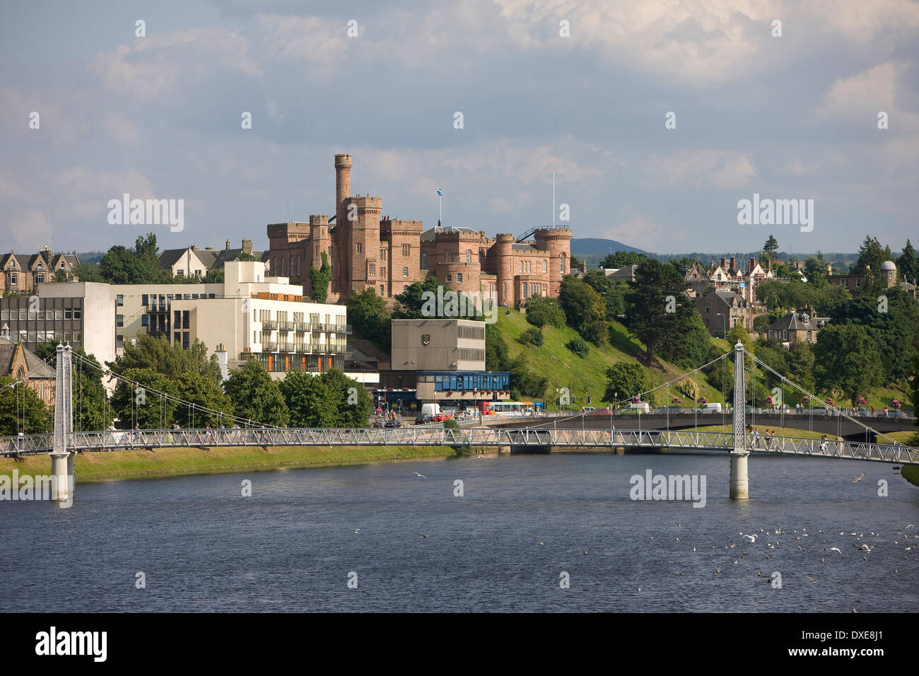 Across the river ness towards footbridge and castle in city of ...