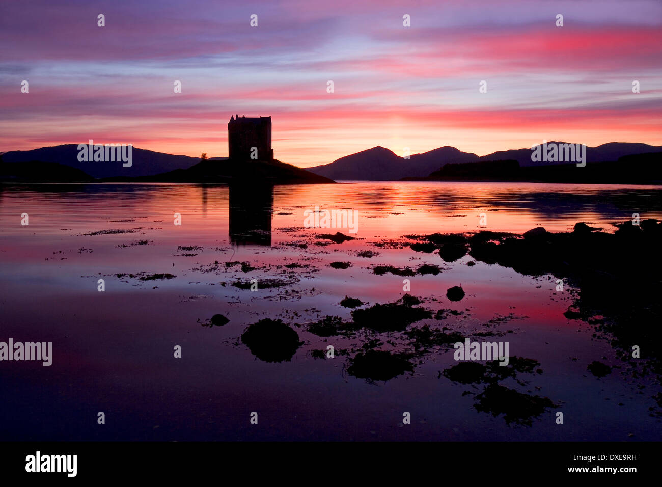 Sunset over Castle Stalker, Appin, Argyll Stock Photo - Alamy