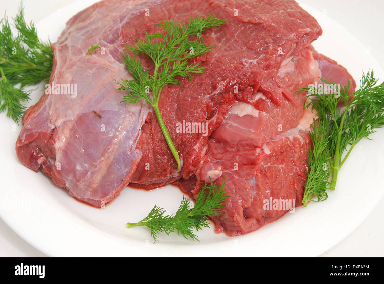 fresh raw meat on white Stock Photo - Alamy