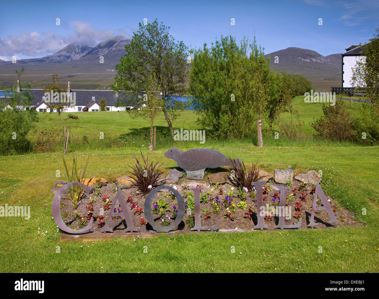 Coalila Distillery with paps of Jura in view, Islay Stock Photo - Alamy