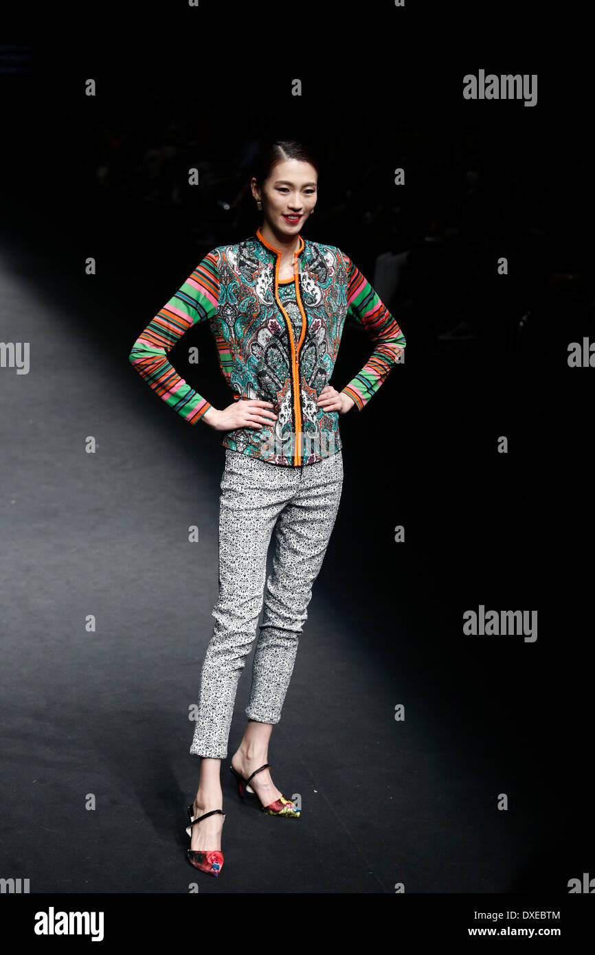 Seoul, South Korea. 24th March 2014. A model presents a creation by ...