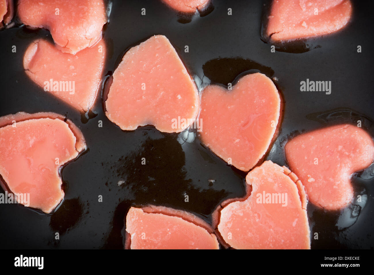 Chocolate pudding with little hearts of marzipan. Macro photo Stock ...