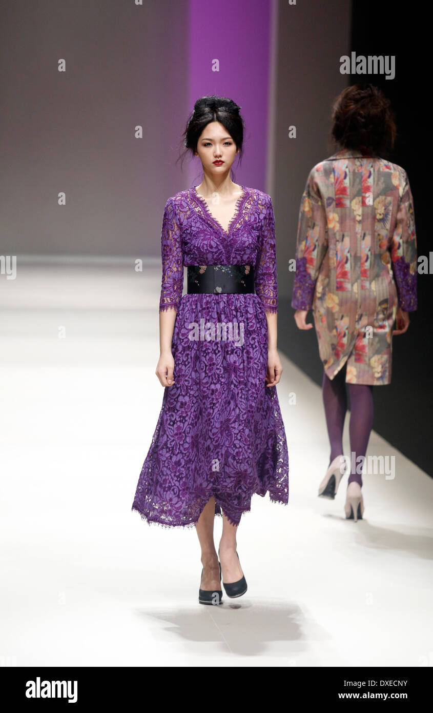 Seoul, South Korea. 24th March 2014. A model presents a creation by ...