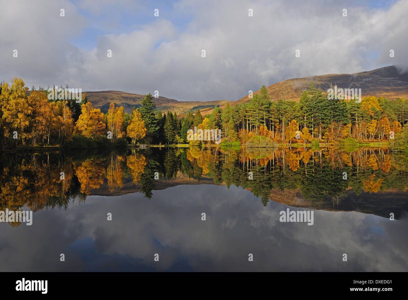 Autumn reflections Lochan trail forest walk,Glencoe Stock Photo - Alamy
