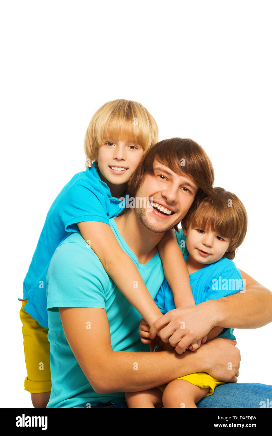 Dad with two little sons Stock Photo - Alamy