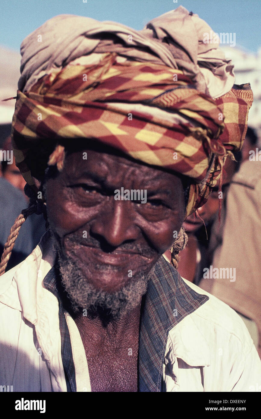 Old Arab man squinting into the sun, Aden, Yemen, 1967 Stock Photo - Alamy