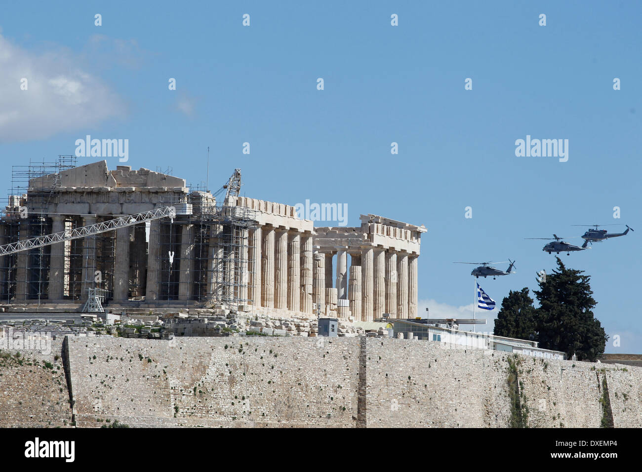 Athens, Greece. 25th Mar, 2014. Military helicopters fly over the ...