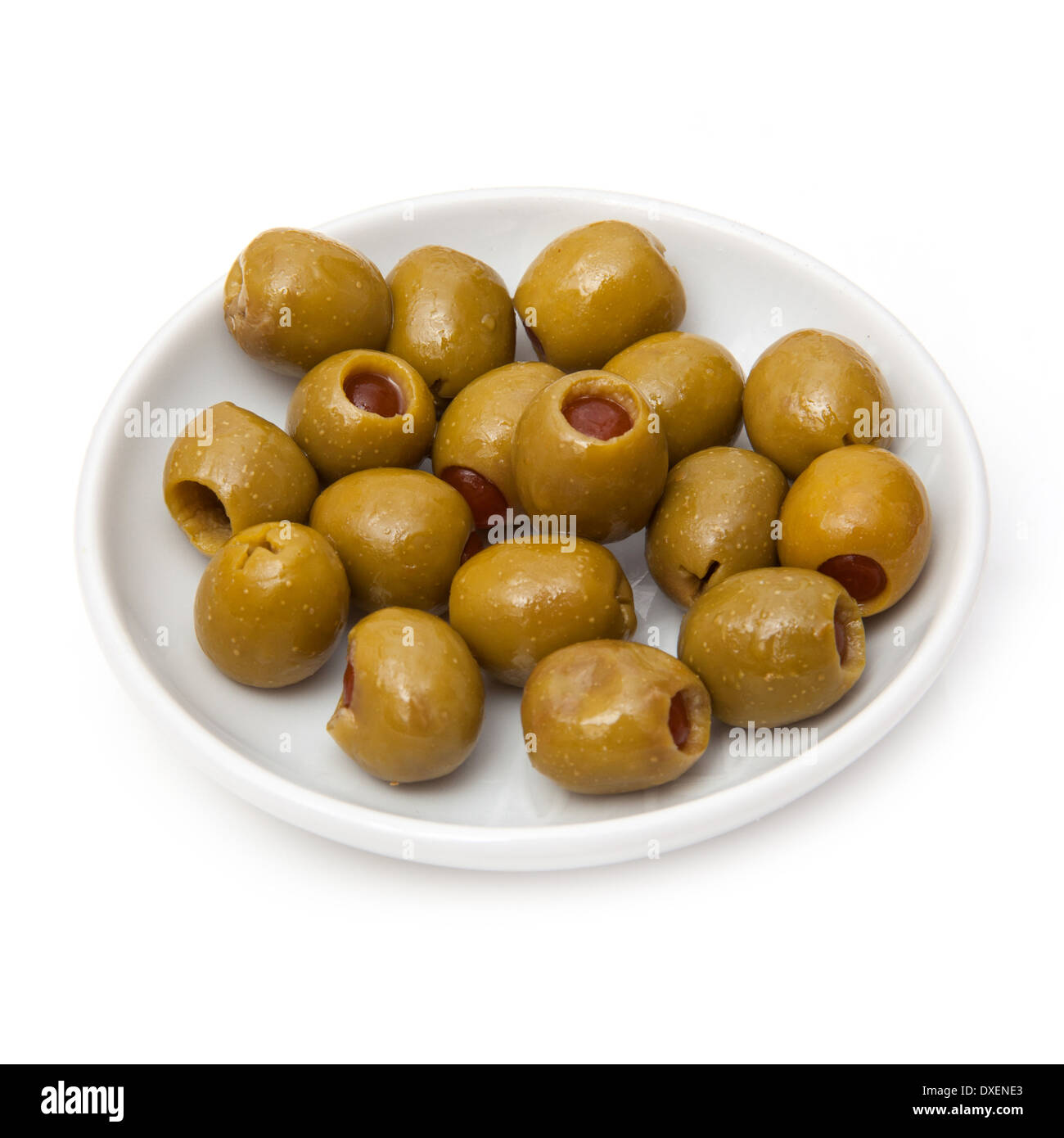 Plate of tapas, Pimento stuffed olives isolated on a white studio ...