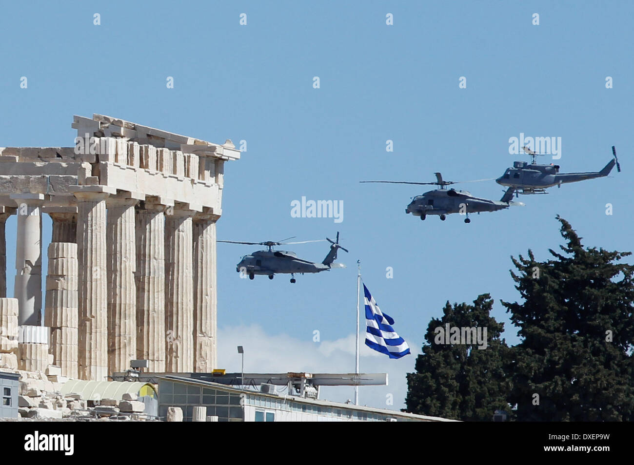 Athens, Greece. 25th Mar, 2014. Military helicopters fly over the ...