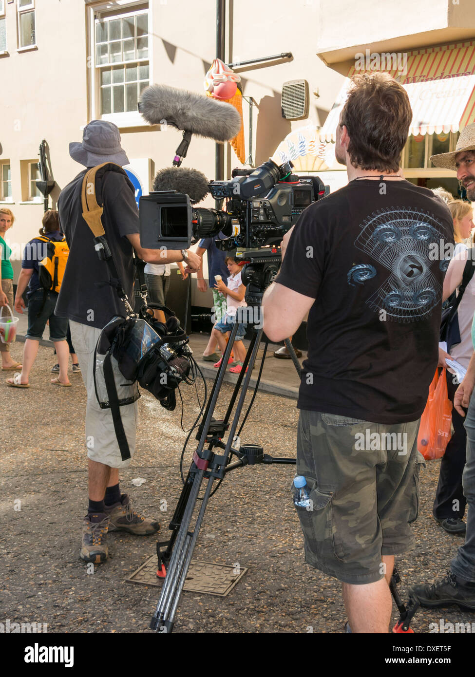 cameraman with sound recoding engineer preparing for filming in Cromer ...