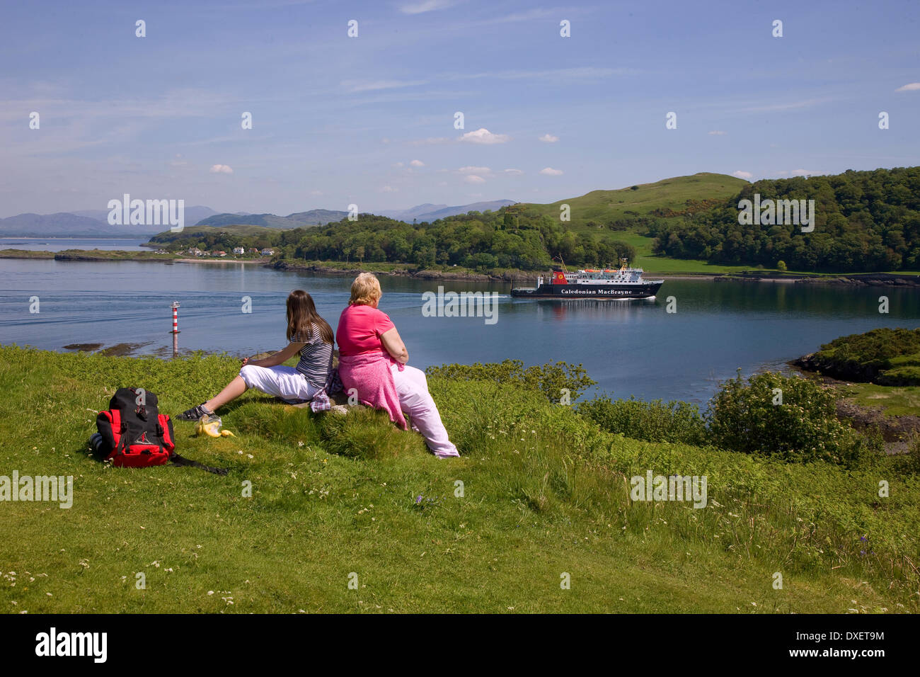 Tourist Watch the ferry pass Dunollie castle from the North end of ...