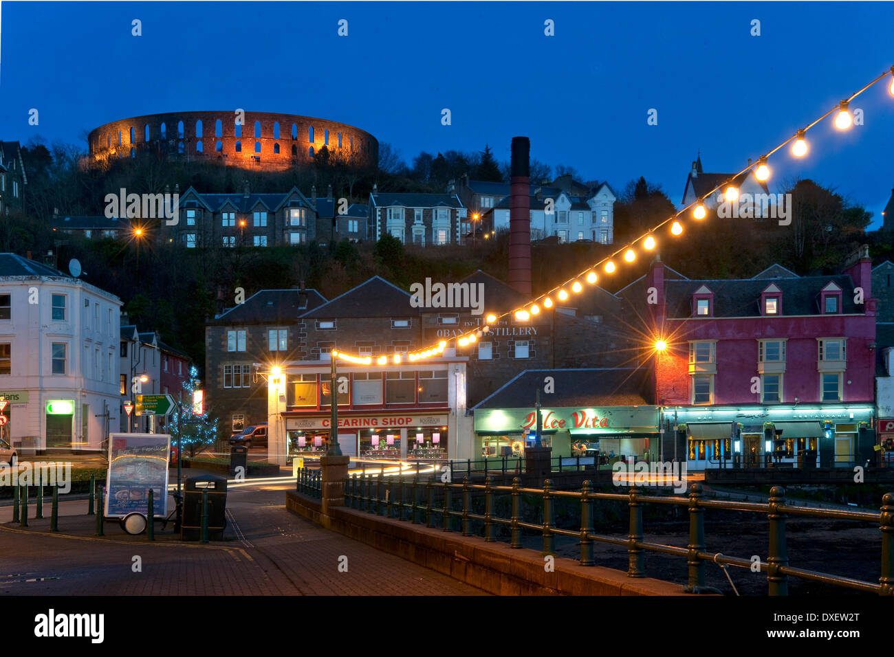 Towards oban town centre and mcCaigs tower at dusk as seen from the ...