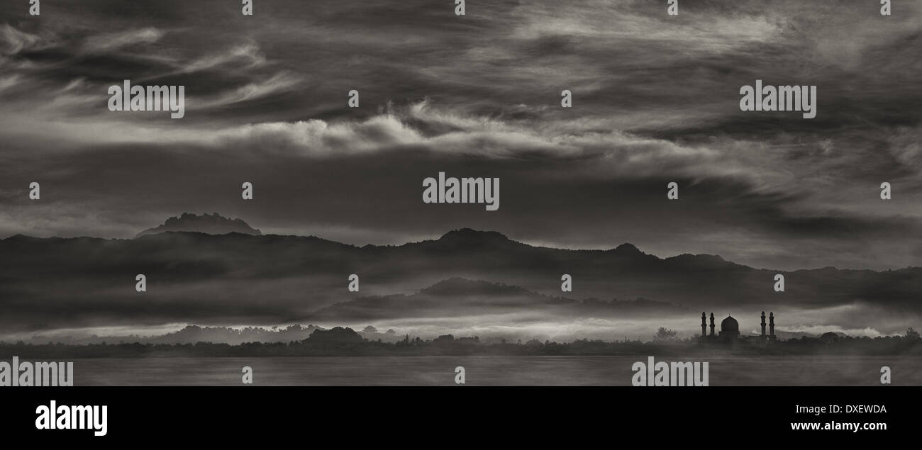 Landscape photograph of Mt Kinabalu in the background and Kota Kinabalu ...