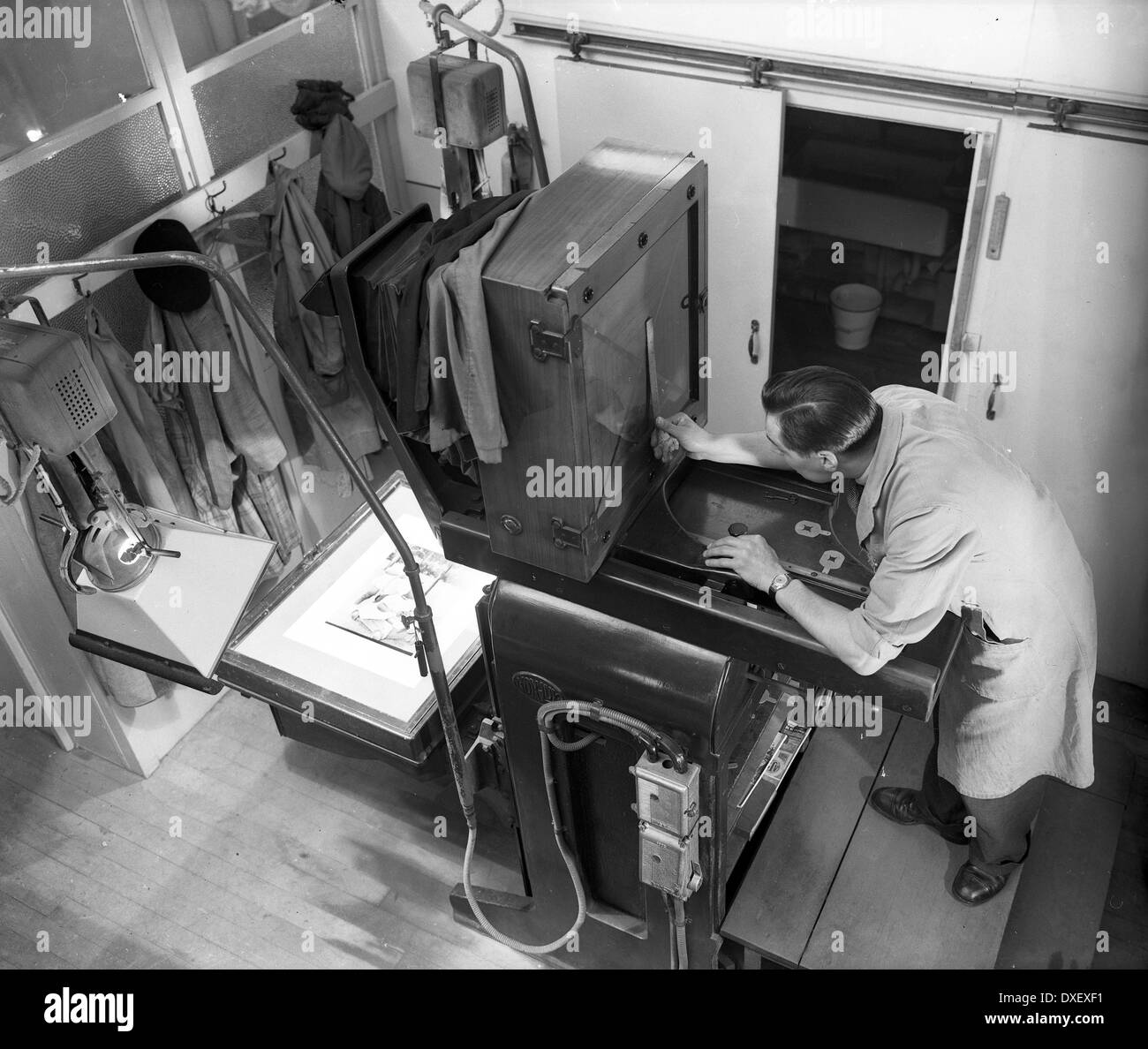Newspaper process department camera room page production 1957 1950s ...