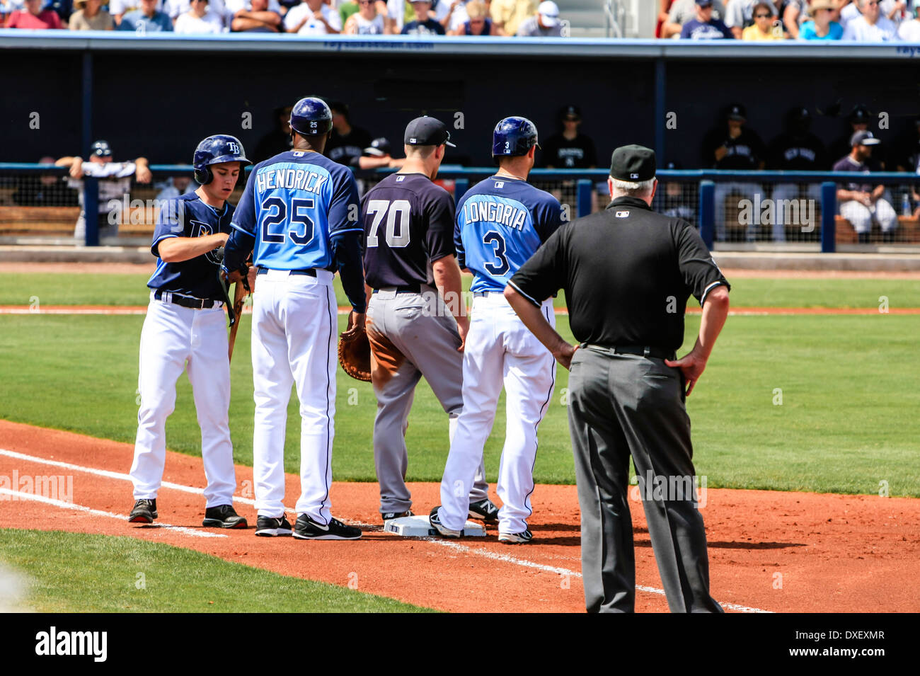 Longoria and Coach Hendrick (25) of the Tampa Bay rays at 1st base of ...