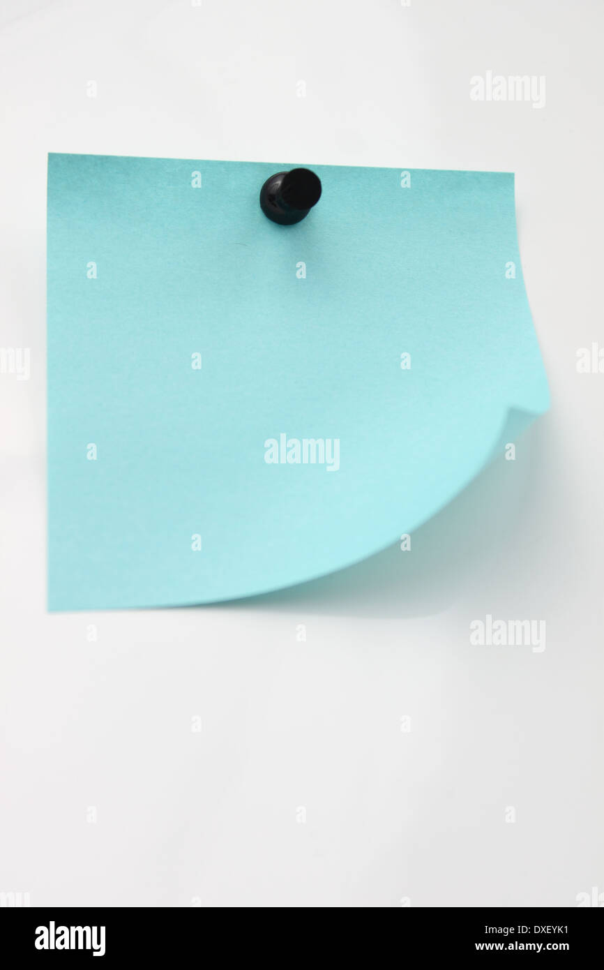 Blue Sticky Note With Blue Push Pin Stock Photo - Alamy