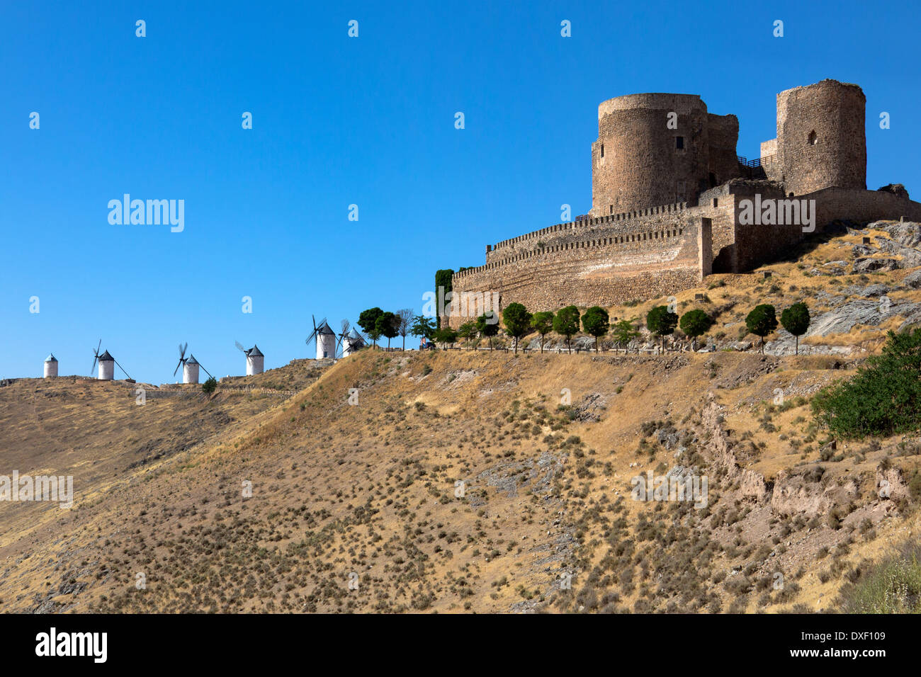 Consuegra Castle and windmills in the La Mancha region of central Spain ...
