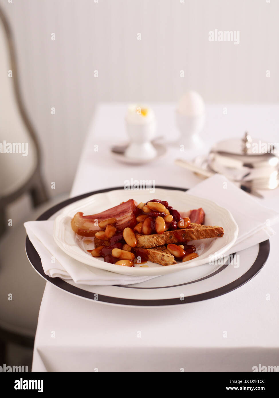 Bacon and Baked Beans on Toast, Studio Shot Stock Photo - Alamy
