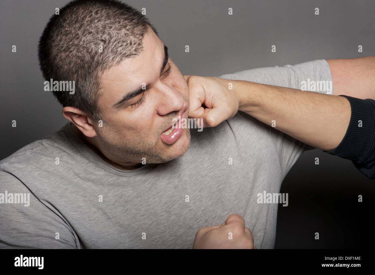 Human hand punch face hi-res stock photography and images - Alamy