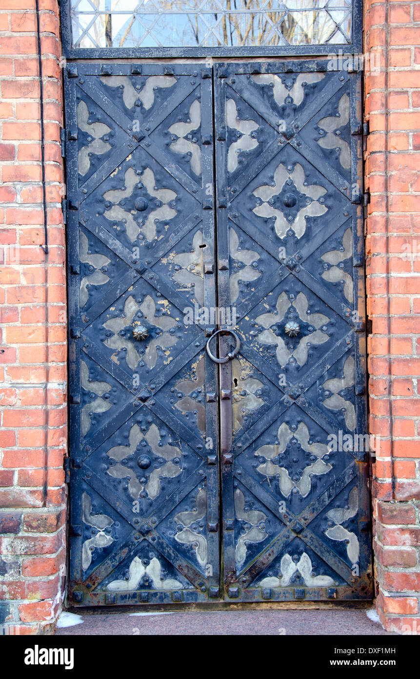 old historical ornamental metal door in city Stock Photo - Alamy