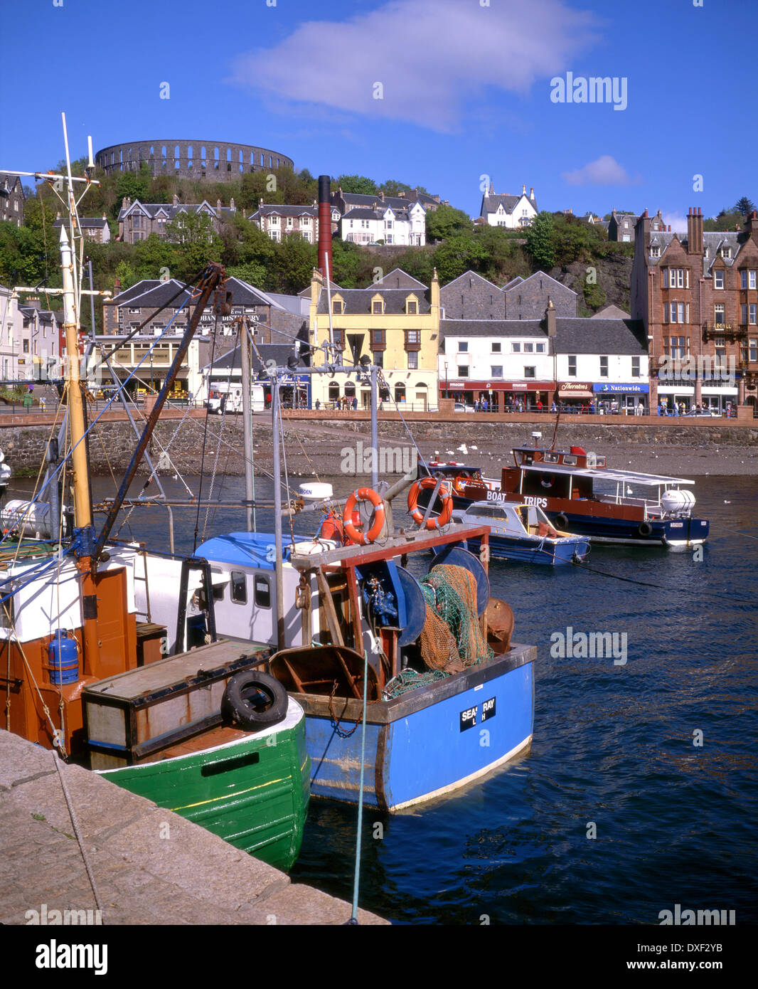 Oban town centre and tower from the North Pier 1990s Stock Photo - Alamy