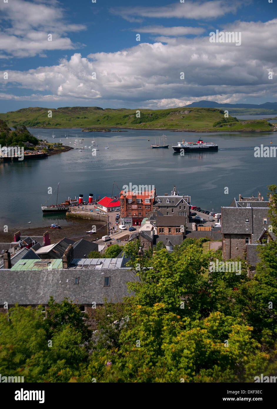 Portrait view across Oban bay from mcCaigs tower with Paddle-steamer ...