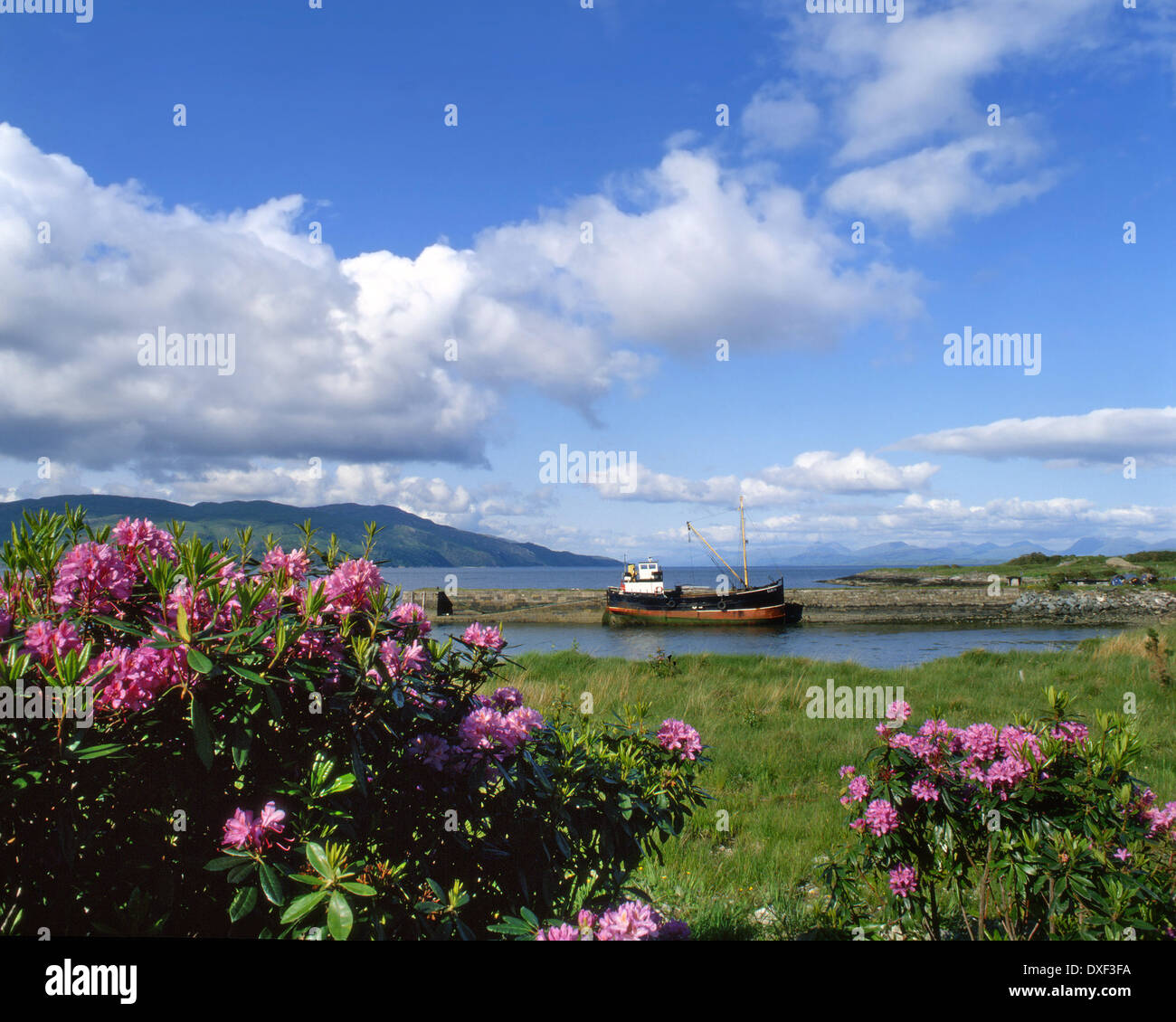 The Clyde Puffer ' Eilean Easdale' is seen here at Craignures old pier ...