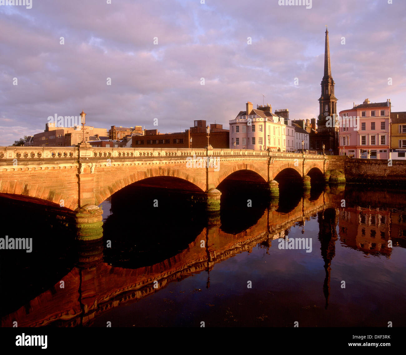 Evening light strikes Ayr town centre and historic bridge, Ayrshire ...