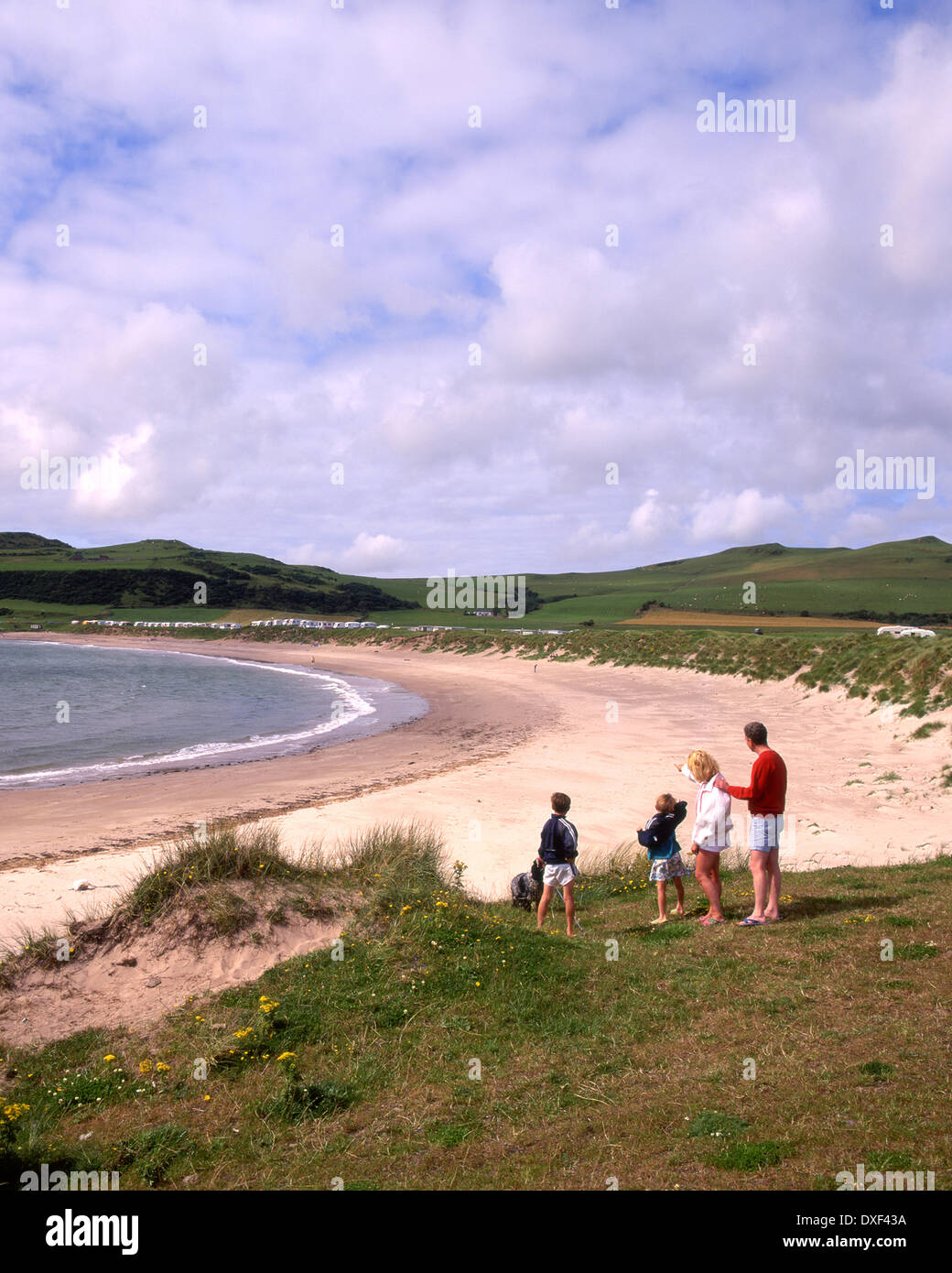 Tourist admire the beautiful sands at Southend near Campbeltown ...