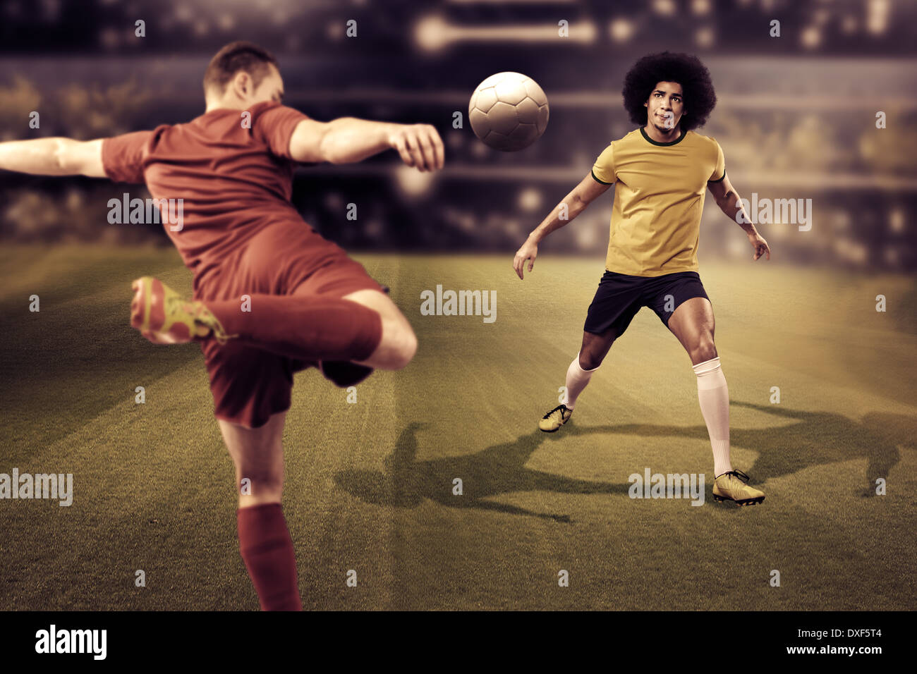 two soccer or football player on the field at a stadium Stock Photo - Alamy