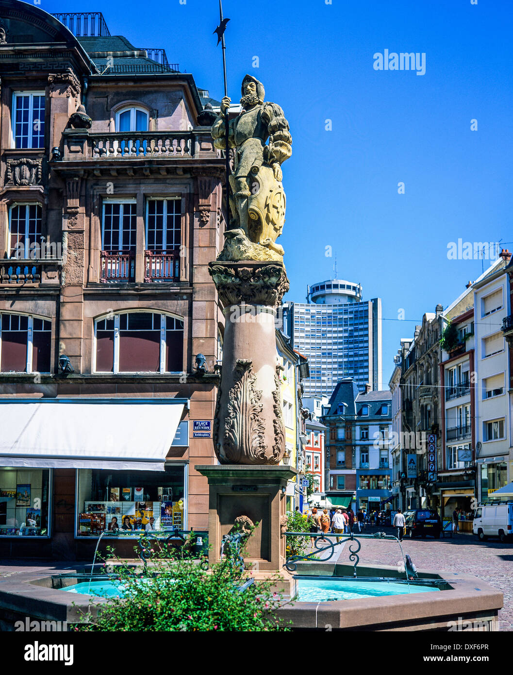 Fountain with halberdier statue and Tour de l'Europe tower Mulhouse ...