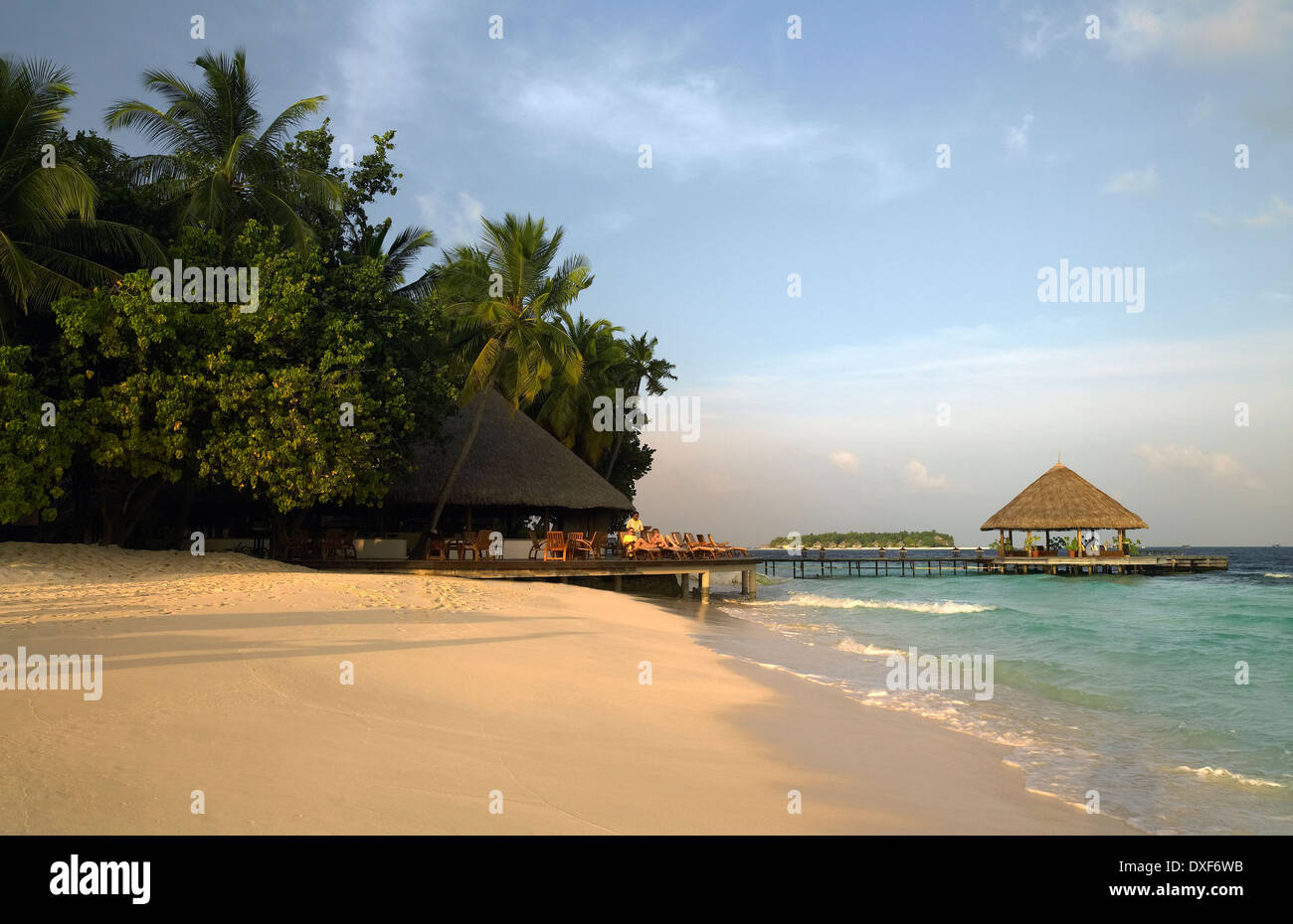 A luxury vacation resort on a small tropical island in the Maldives in ...