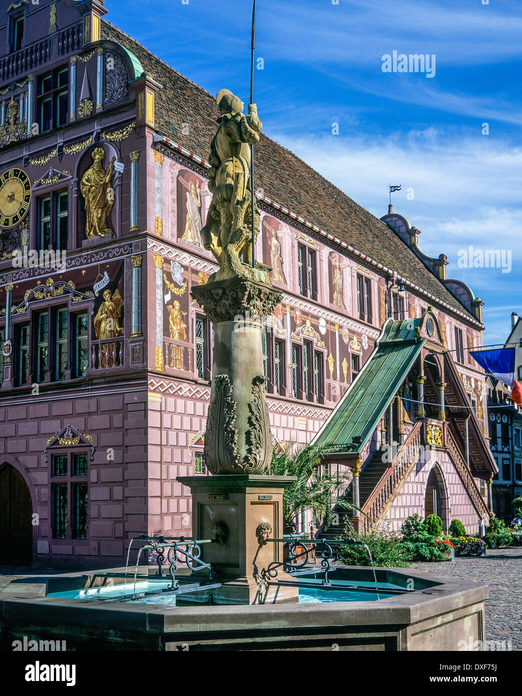 Fountain with halberdier statue and Renaissance former city hall 16th ...
