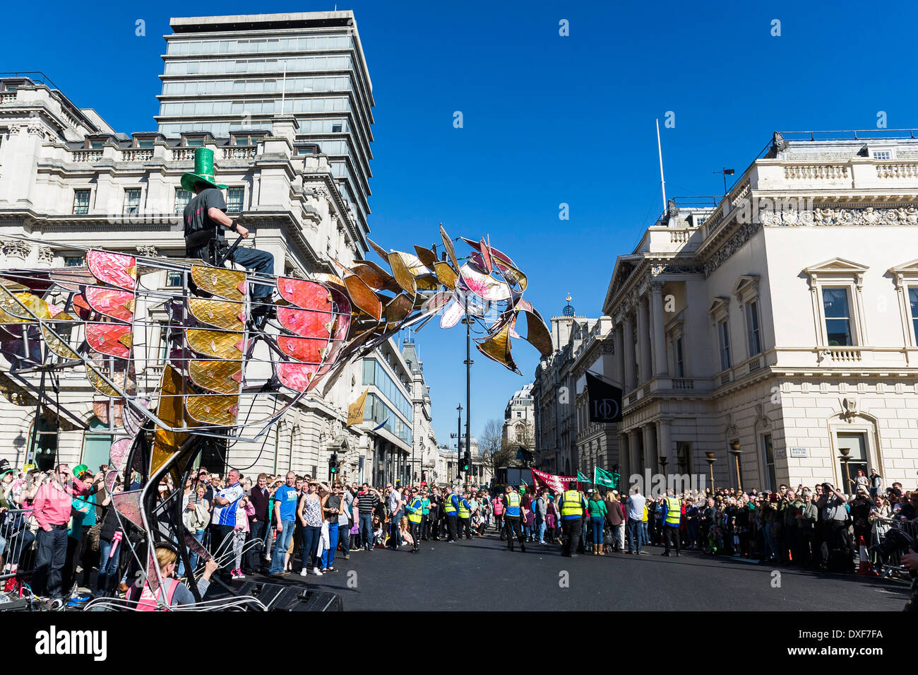 A large mechanical puppet towers of the crowds during the St Patricks ...